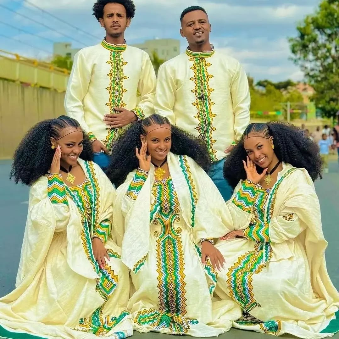 Vibrant Green Matching Ethiopian Couples Outfit: Mesmerizing Cultural ...